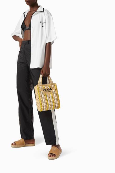 Shop Prada Neutral Re-edition 2005 Shoulder Bag in Woven Raffia for ...